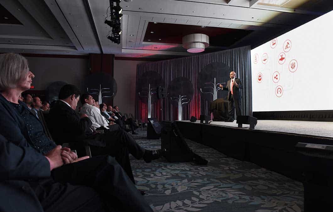 Keynote speaker for business development conference on stage in Houston ...